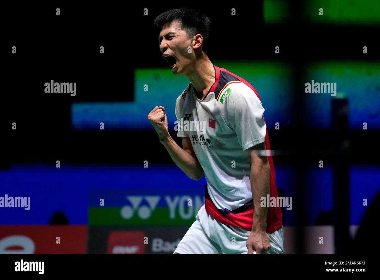 Zhao Jun Peng of China celebrates a point as he plays H.S. Prannoy of ...