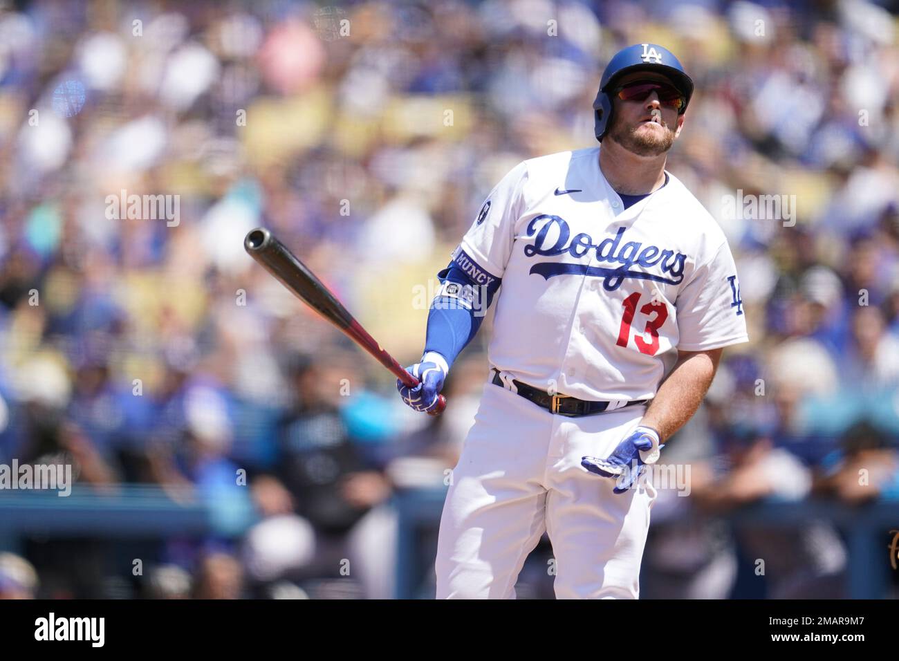 Los Angeles Dodgers' Max Muncy bats against the Miami Marlins during a ...