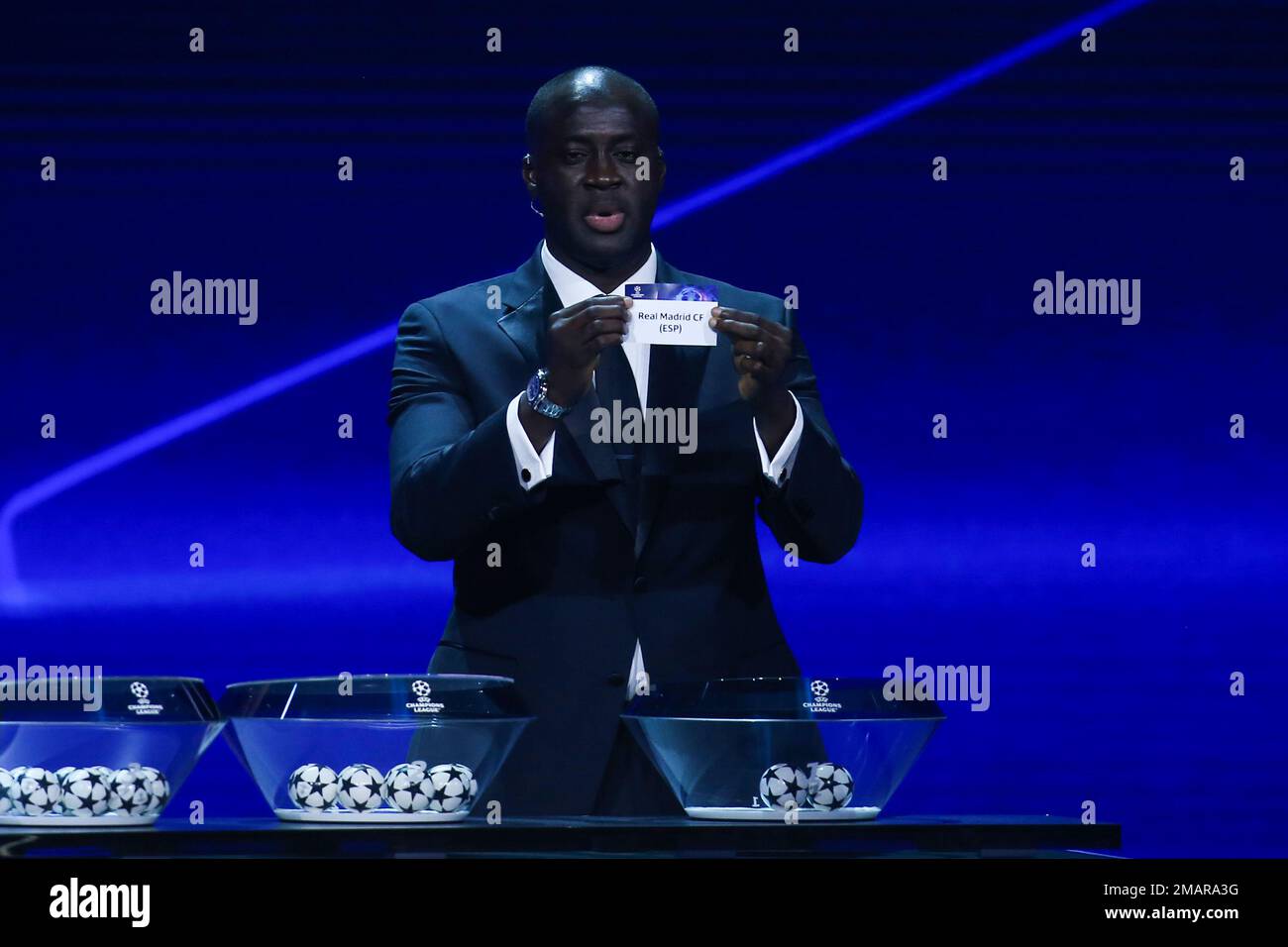 Ivorian coach and former player Yaya Toure shows the name of Real Madrid during the soccer ...