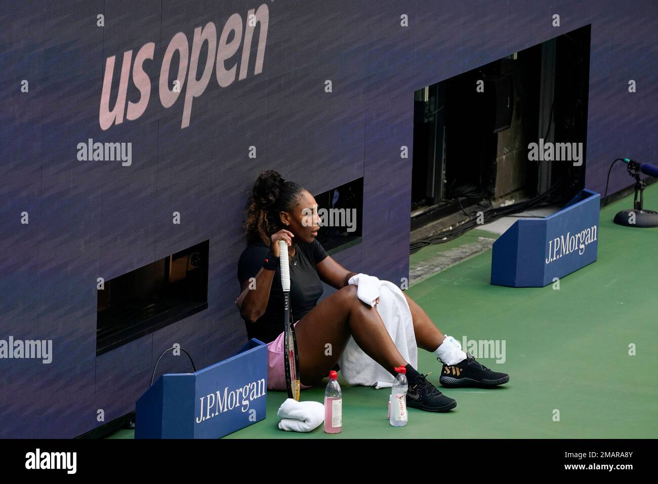 Serena Williams rests while practicing at Arthur Ashe Stadium before ...