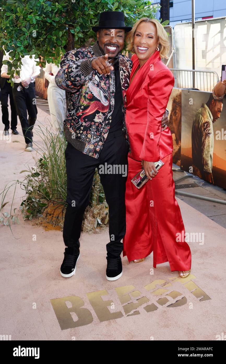 Will Packer, left, and Heather Packerpose for photographers upon ...