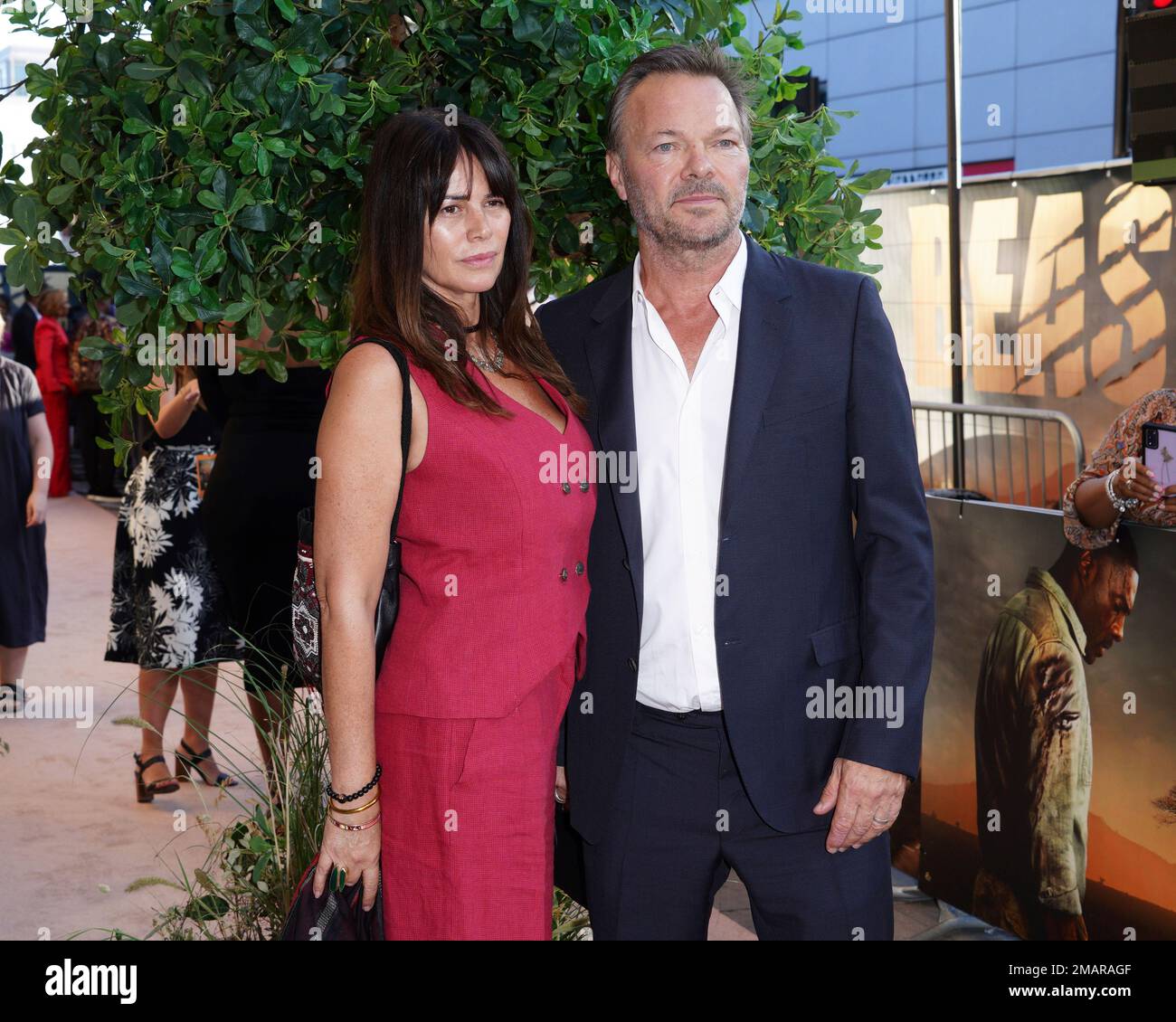 Carolina Acosta, left, and Pete Tong pose for photographers upon ...
