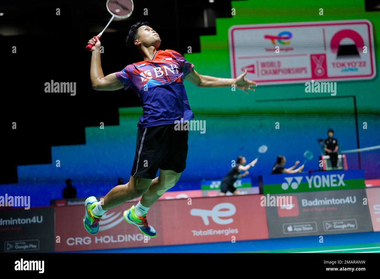 Anthony Sinisuka Ginting of Indonesia plays a return during a badminton ...