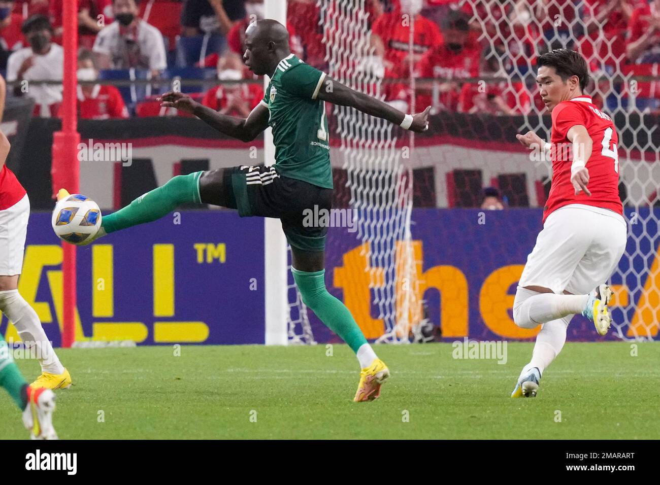 South Korea's Jeonbuk Hyundai Motors' Modou Barrow attempts to control ...