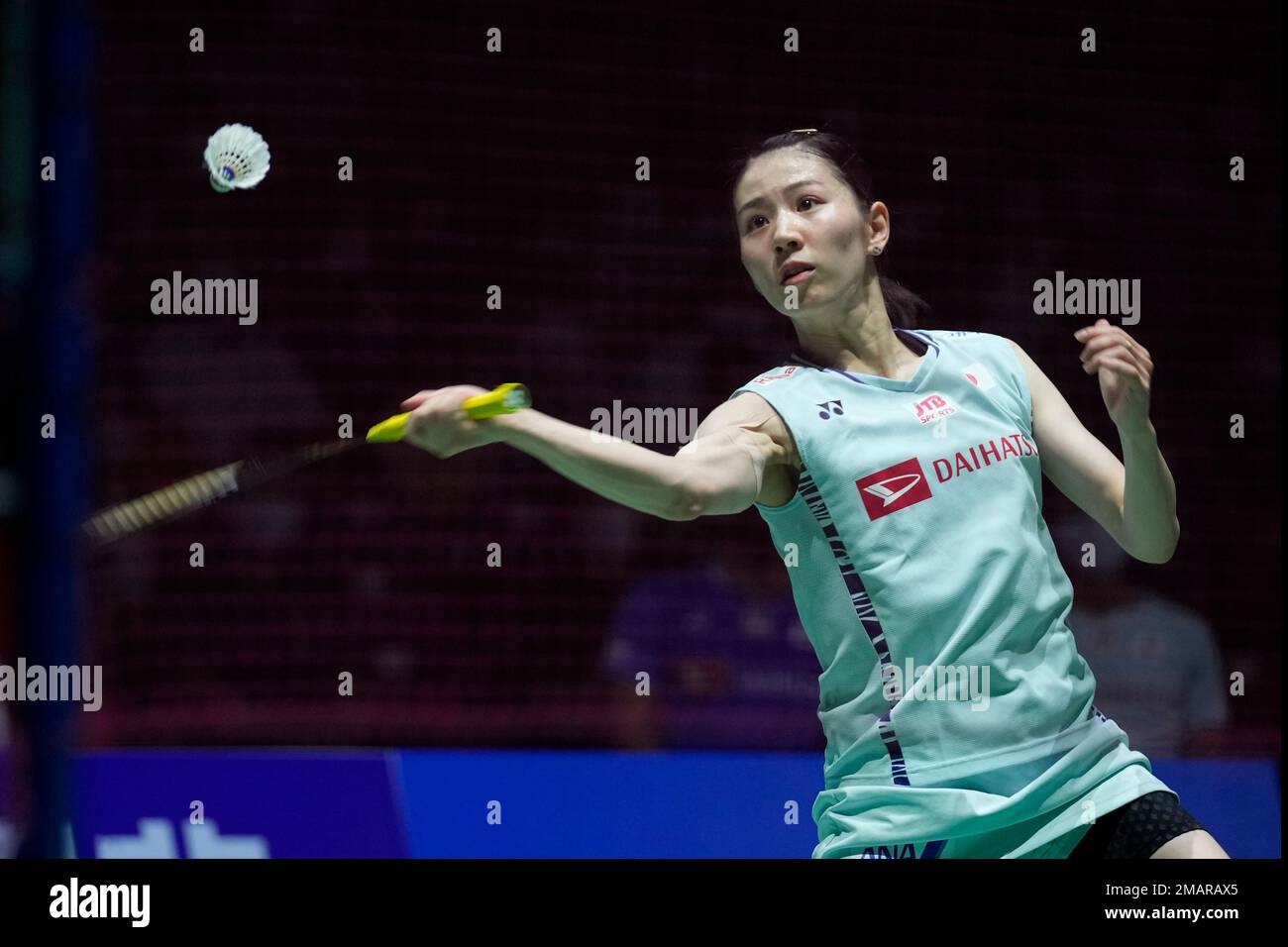 Chiharu Shida of Japan, with Nami Matsuyama, plays a return during a badminton game of the women ...