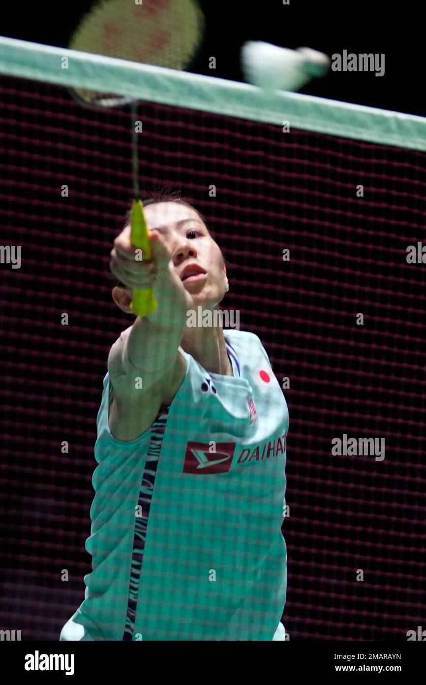 Chiharu Shida of Japan, with Nami Matsuyama, plays a return during a ...