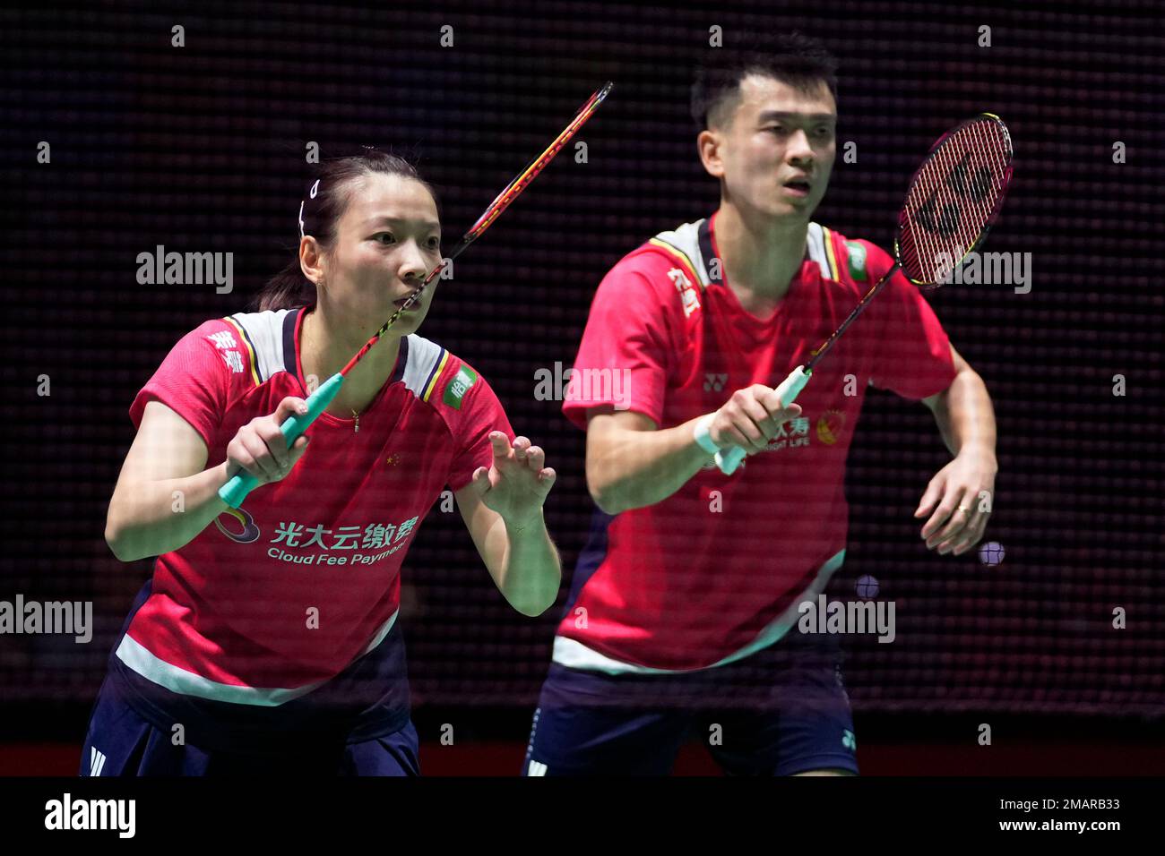 Zheng Si Wei, left, and Huang Ya Qiong of China compete in a badminton ...