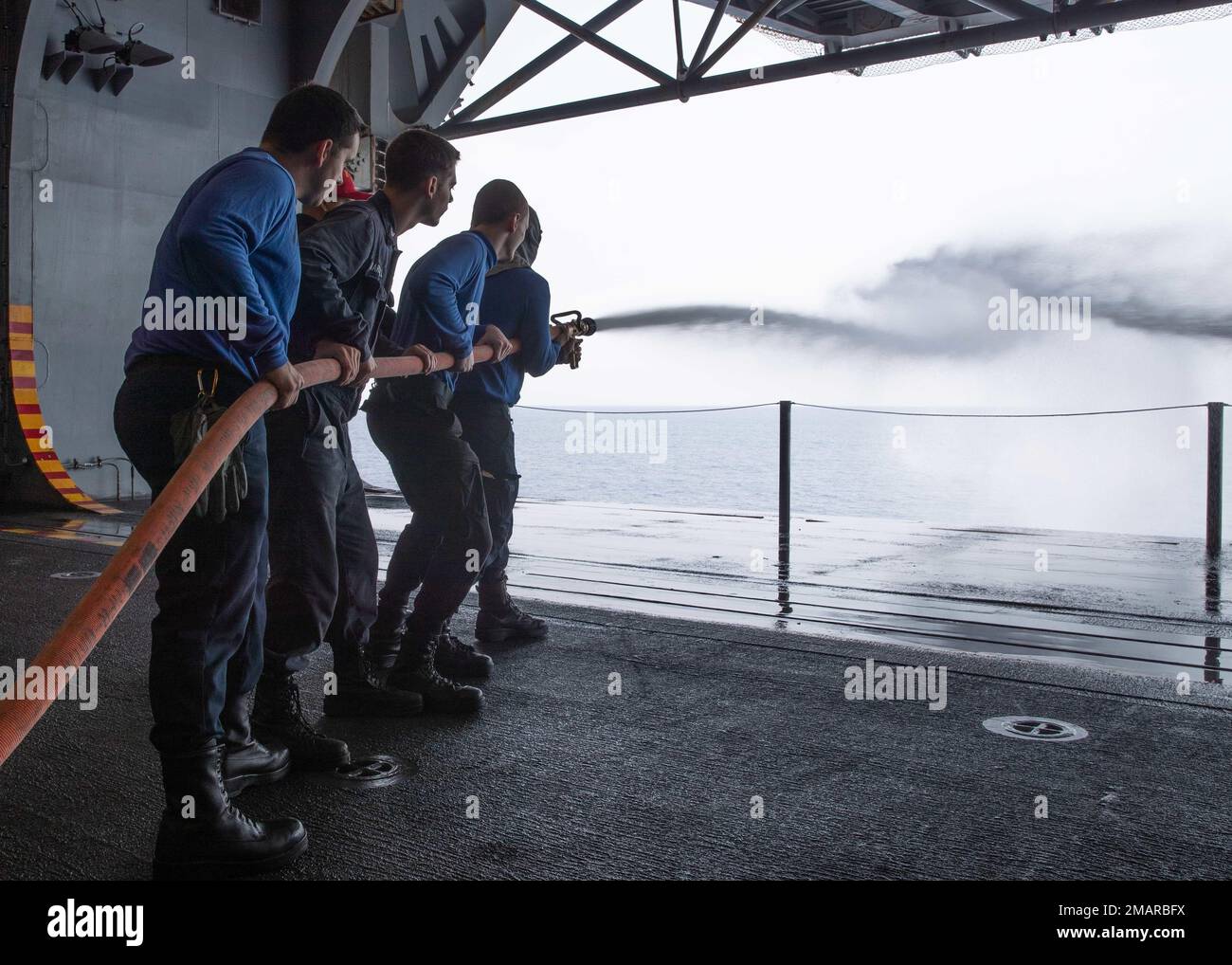 Fire hose handling hi-res stock photography and images - Alamy