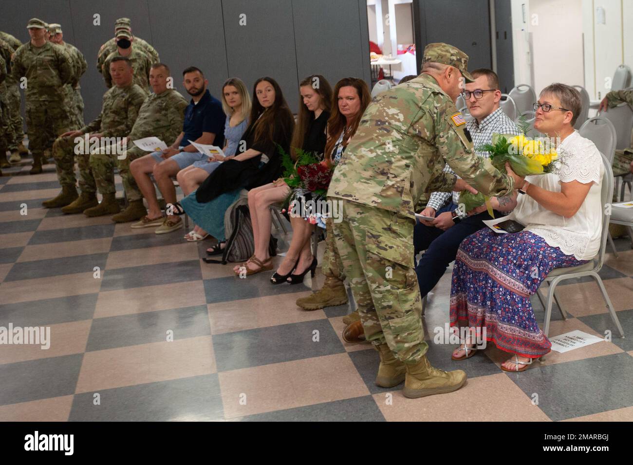 U.S. Army Command Sgt. Maj. Oscar Laughman’s wife, Jennifer, receives ...