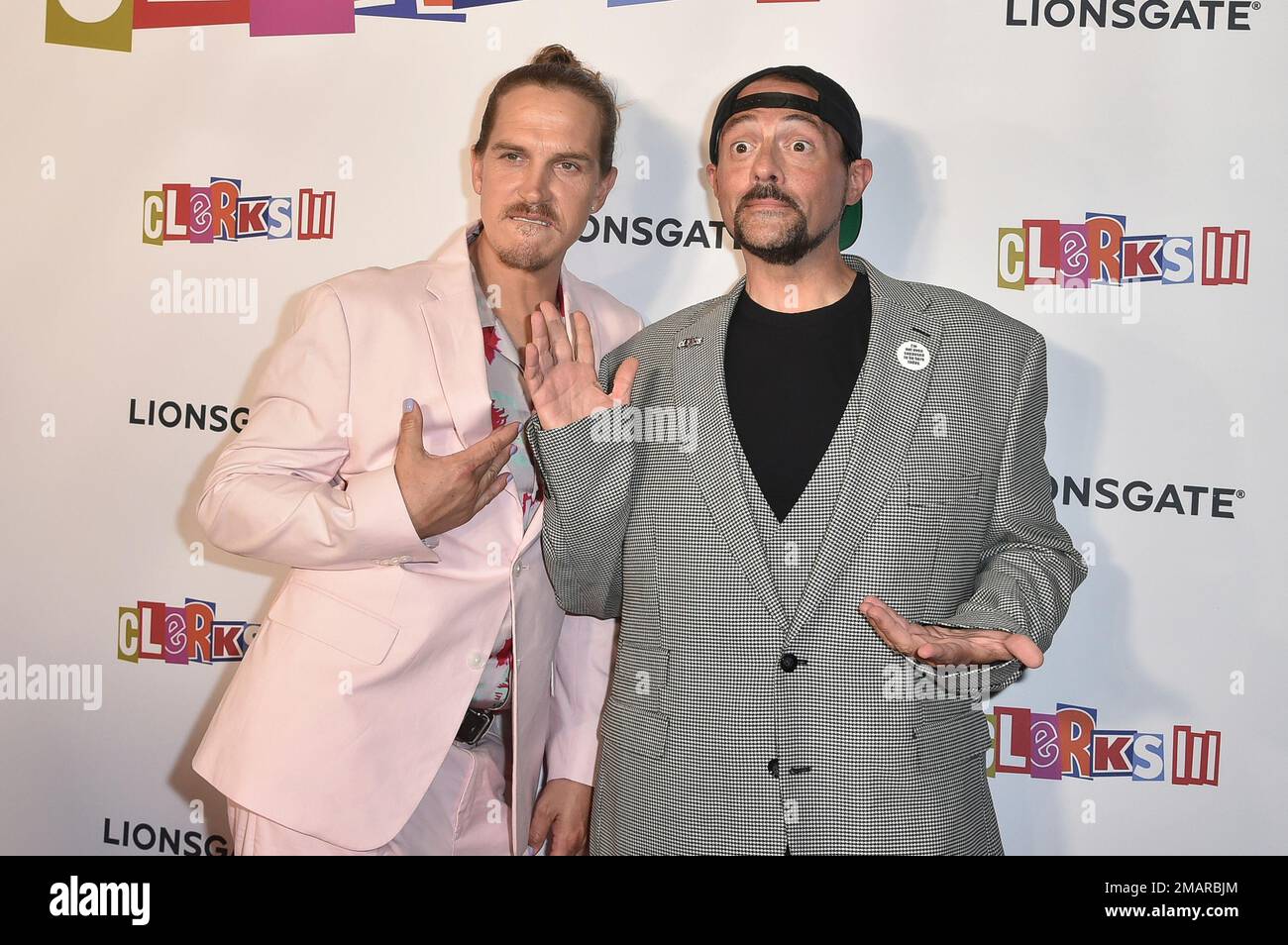 Kevin Smith, right, and Jason Mewes arrive at the premiere of "Clerks ...