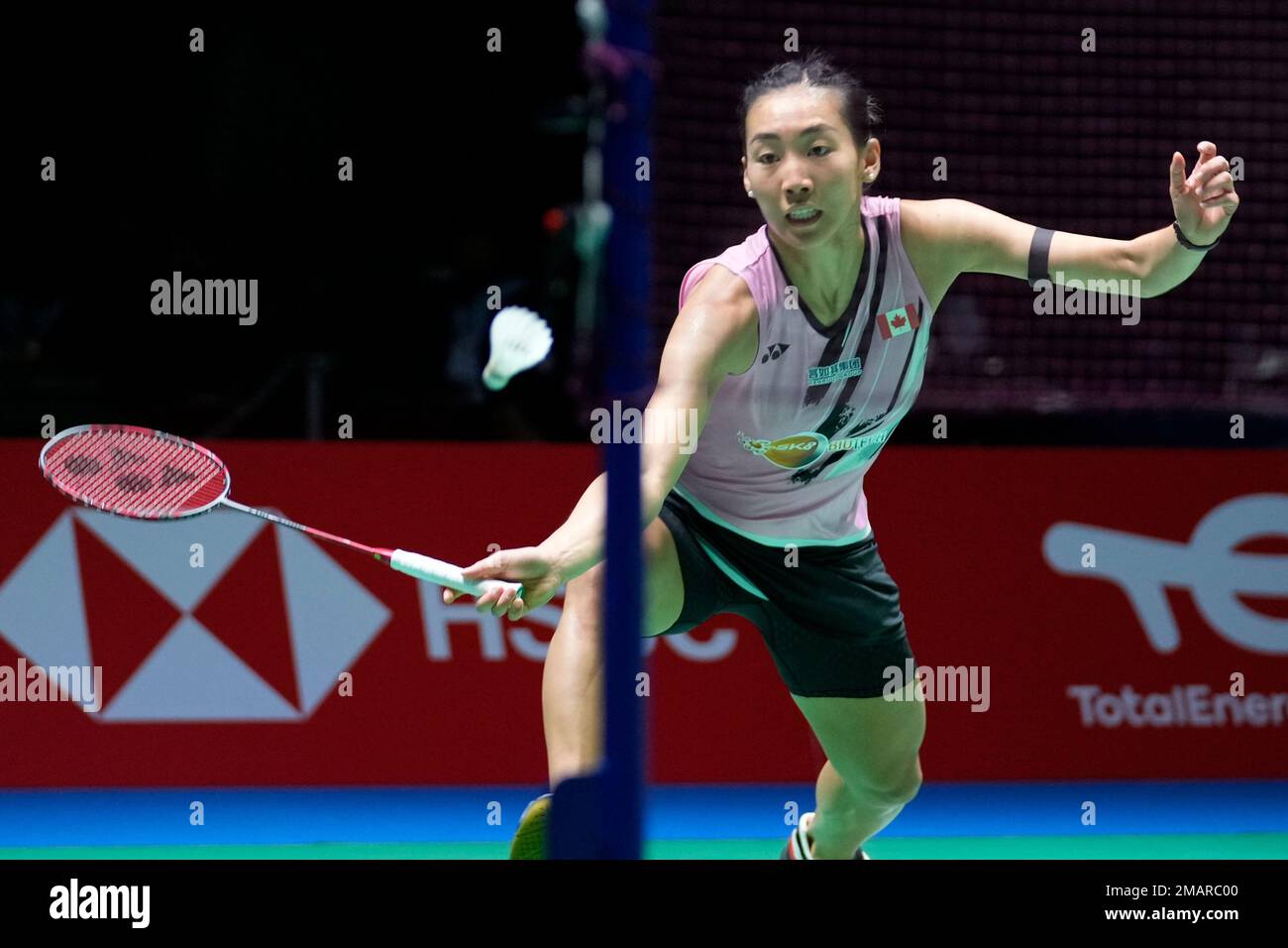 Michelle Li of Canada plays a return during a badminton game of the ...