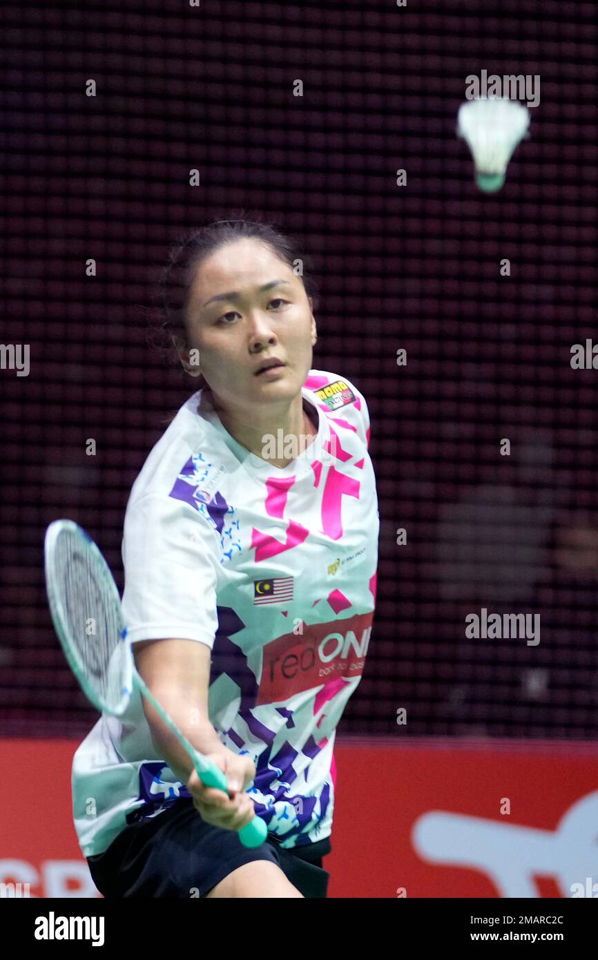 Lim Chiew Sien of Malaysia, with Vivian Hoo, plays a return during a ...