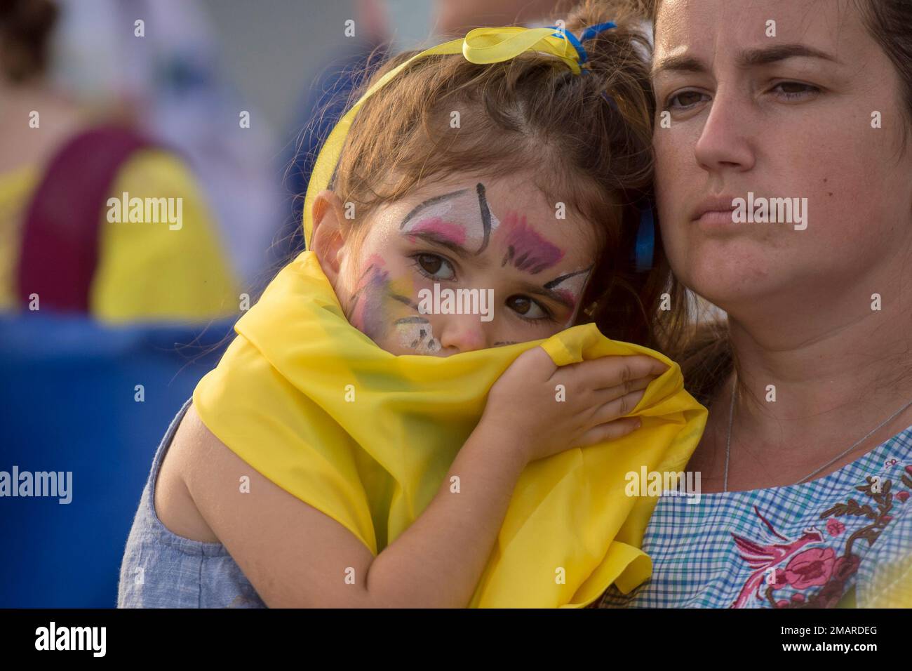 Ukrainian refugees attend an event marking the country's Independence ...