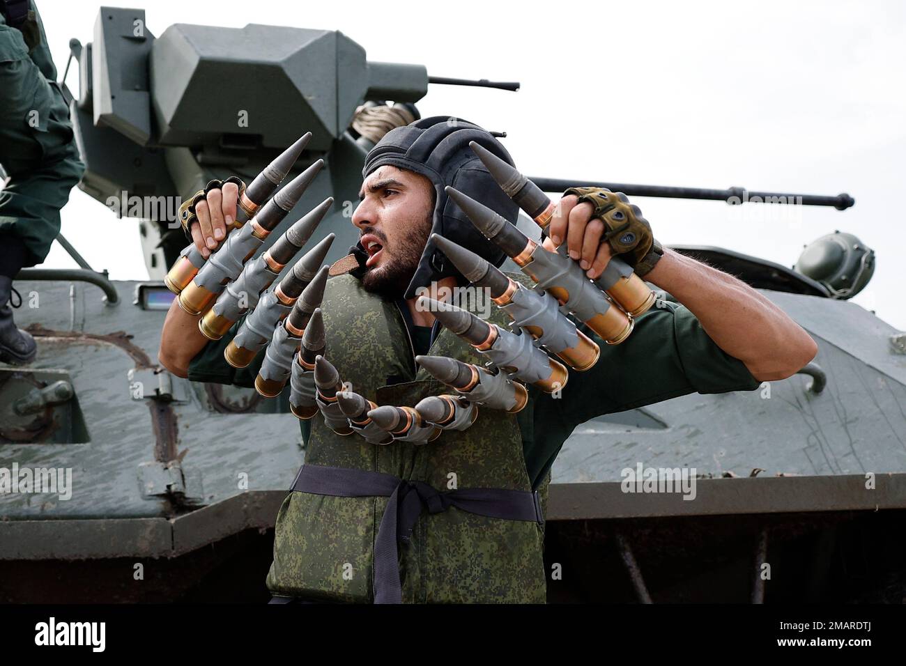 Servicemen of Iranian army on Russian armoured personnel carrier BTR ...