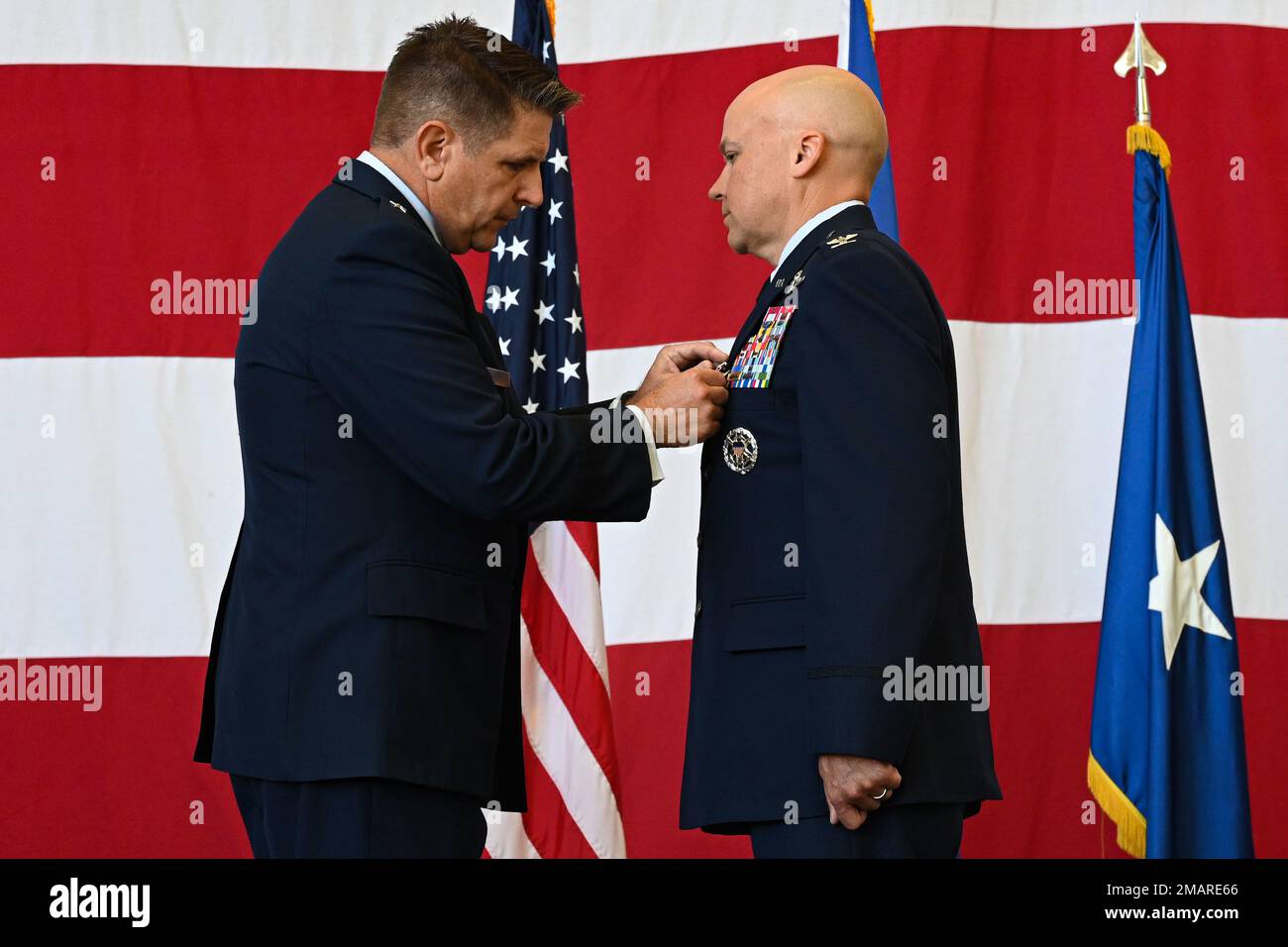 Brig. Gen. Christopher Amrhein, 19th Air Force vice commander, presents ...