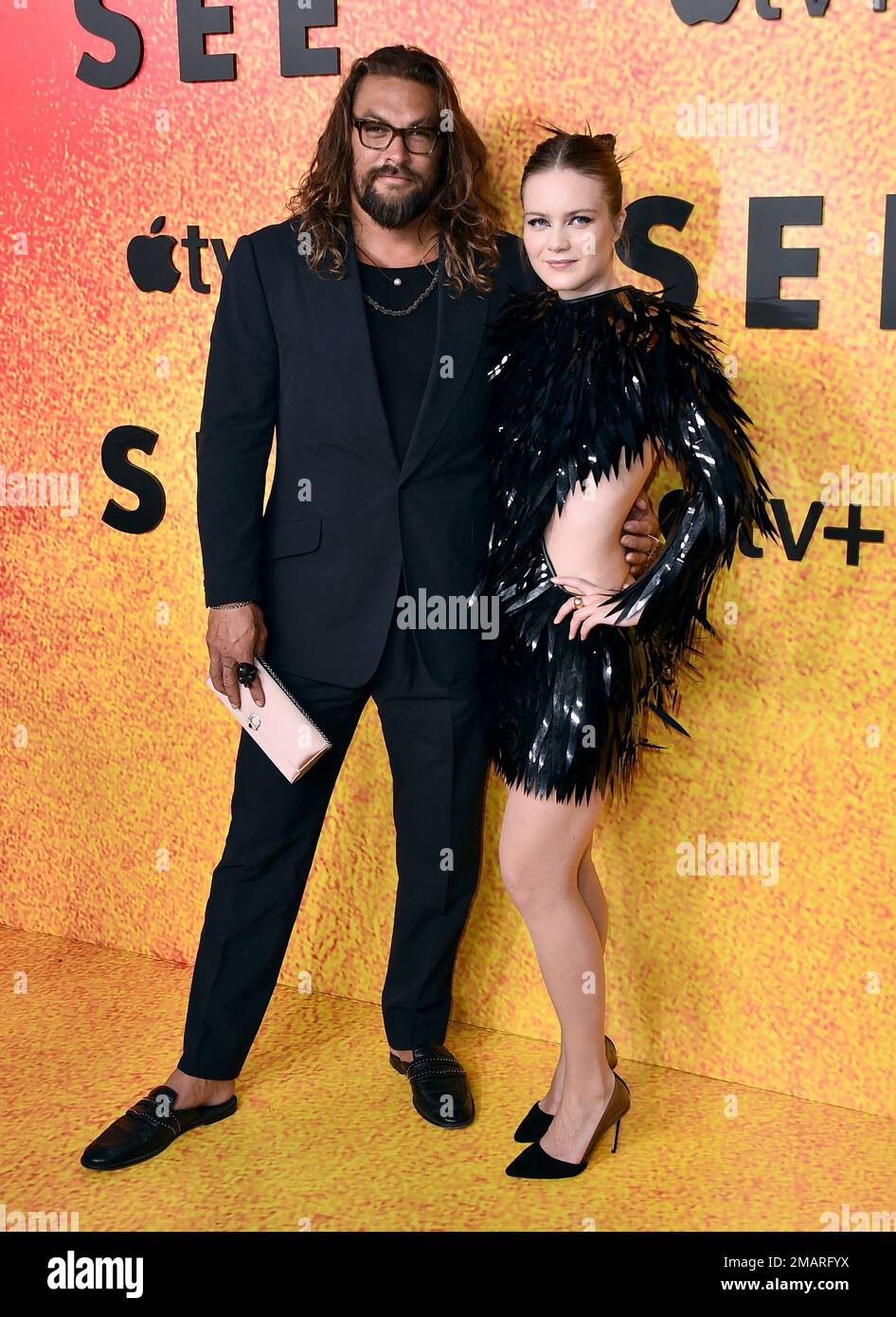 Jason Momoa, left, and Hera Hilmar arrive at the premiere of the third ...