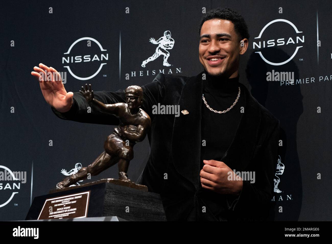 FILE - Alabama quarterback Bryce Young poses for a photograph after ...