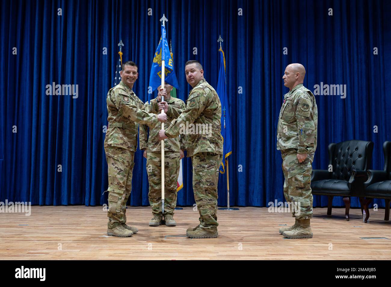U.S. Air Force Lt. Col. Gregory S. Sell, center, incoming commander of ...
