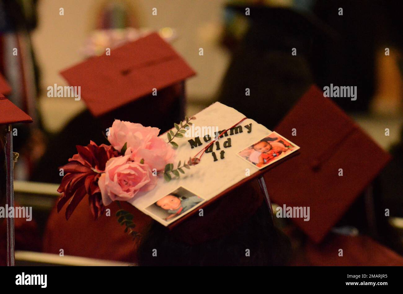 A special decorated graduation cap reading “Mommy did it,” seen in the ...