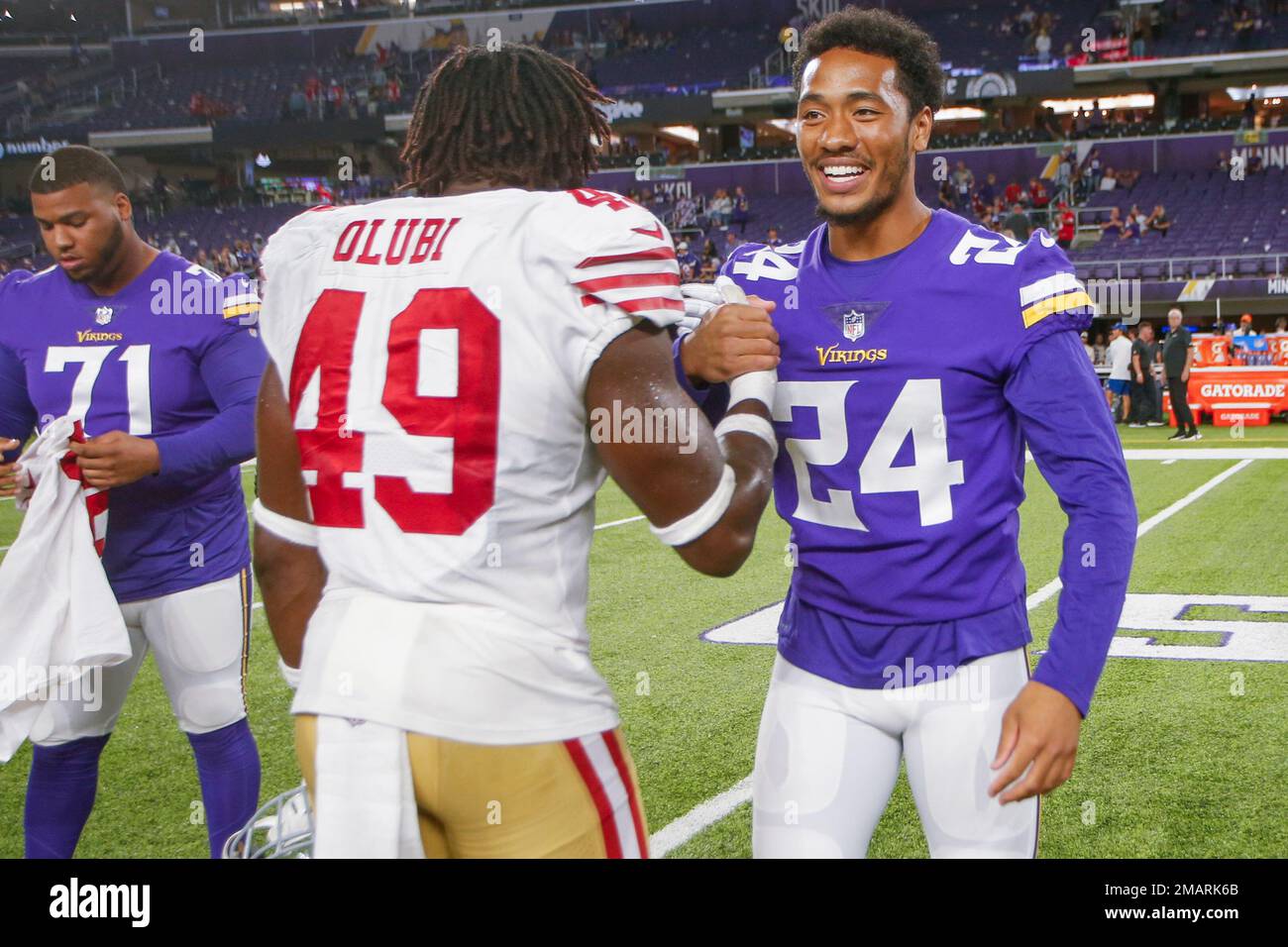 Minnesota Vikings safety Camryn Bynum (24) greets San Francisco 49ers ...