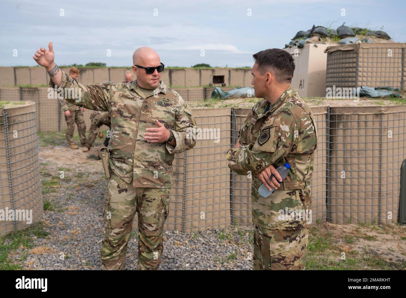 U.S. Army Sgt. 1st Class Michael Dorman, left, noncommissioned officer ...