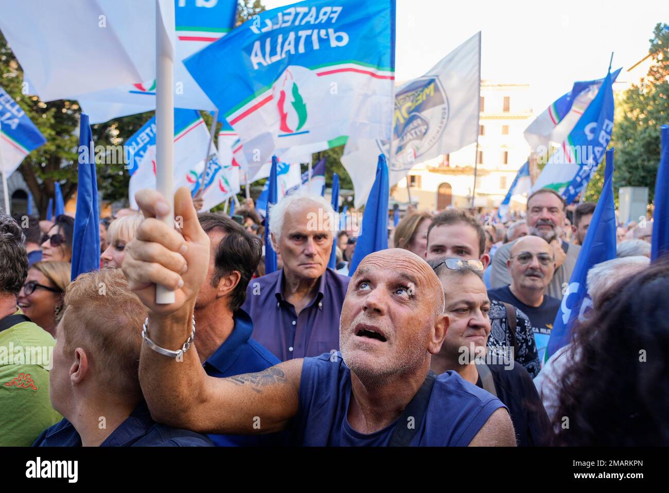 People wave flags as Right-wing party Brothers of Italy's leader ...