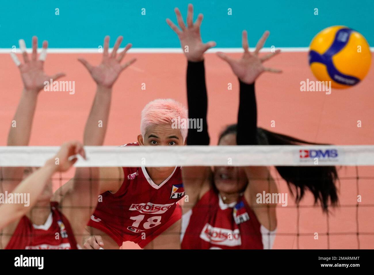 Philippines' Diana Mae prepares to return a shot from China during ...