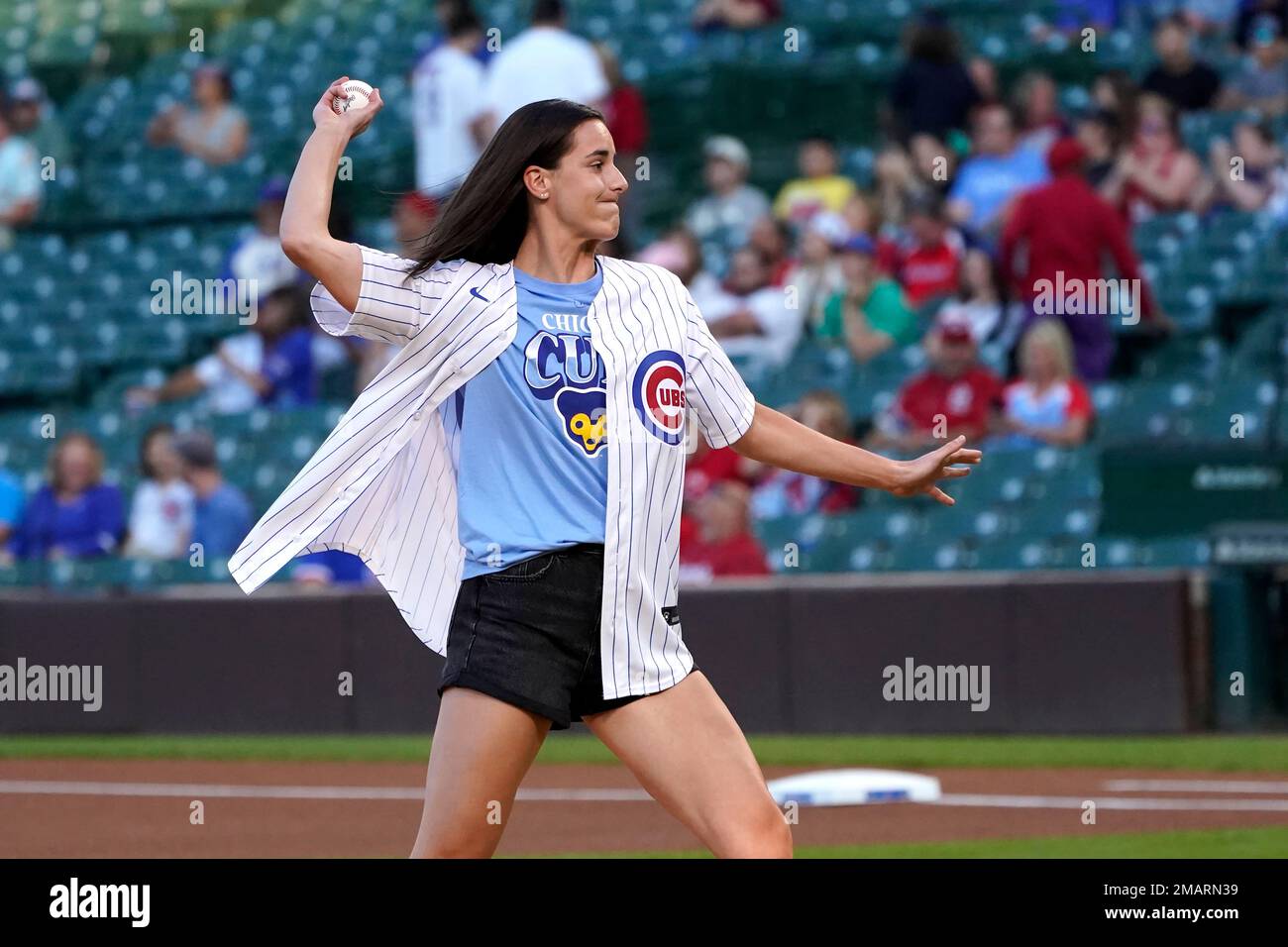 University of Iowa Women's basketball player Caitlin Clark throws out a ceremonial first pitch ...