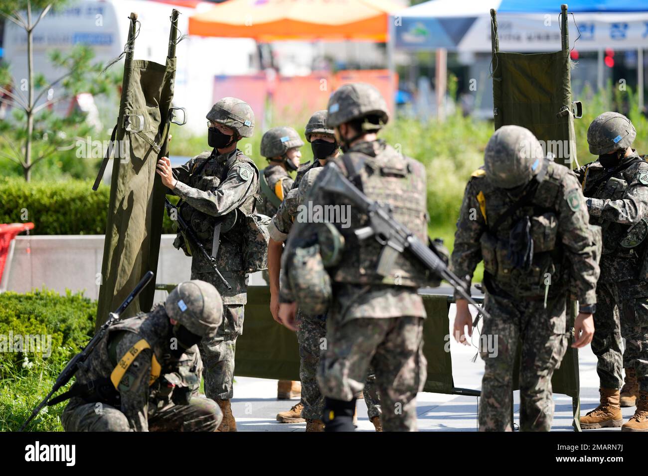 South Korean soldiers prepare stretchers during an anti-terror drill as ...
