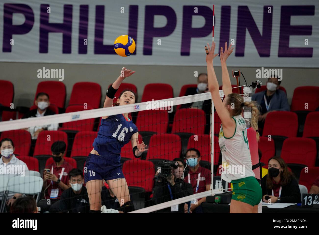 Taiwan's Chen Tzu-Ya, left, hits the ball during their preliminary ...