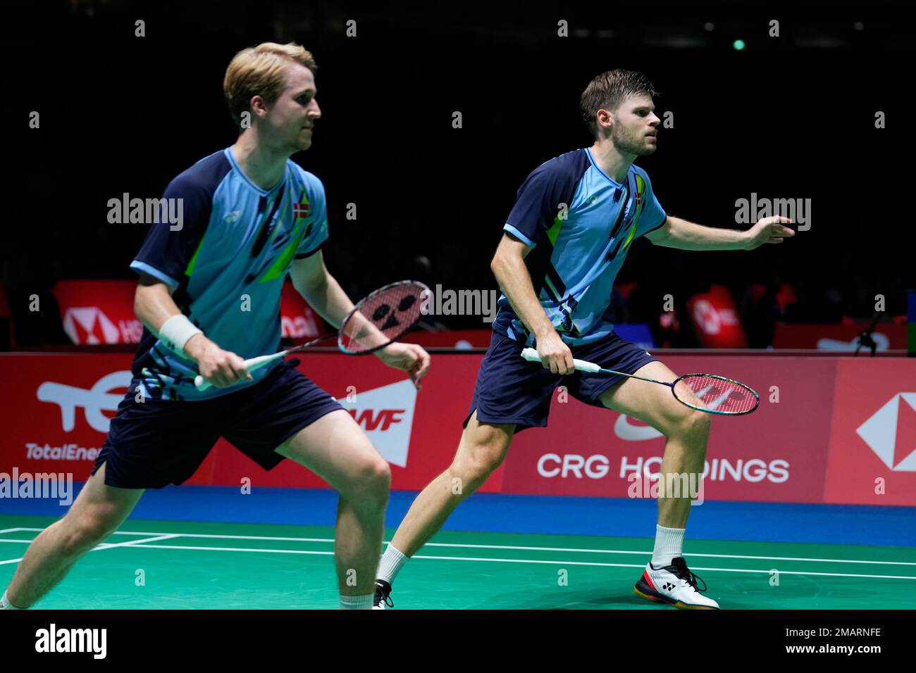 Jeppe Bay and Lasse Molhede of Denmark, compete in a badminton game of ...