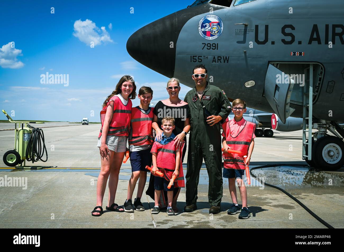 Maj. Troy Martin, 155th Air Refueling Wing pilot, poses with his family ...