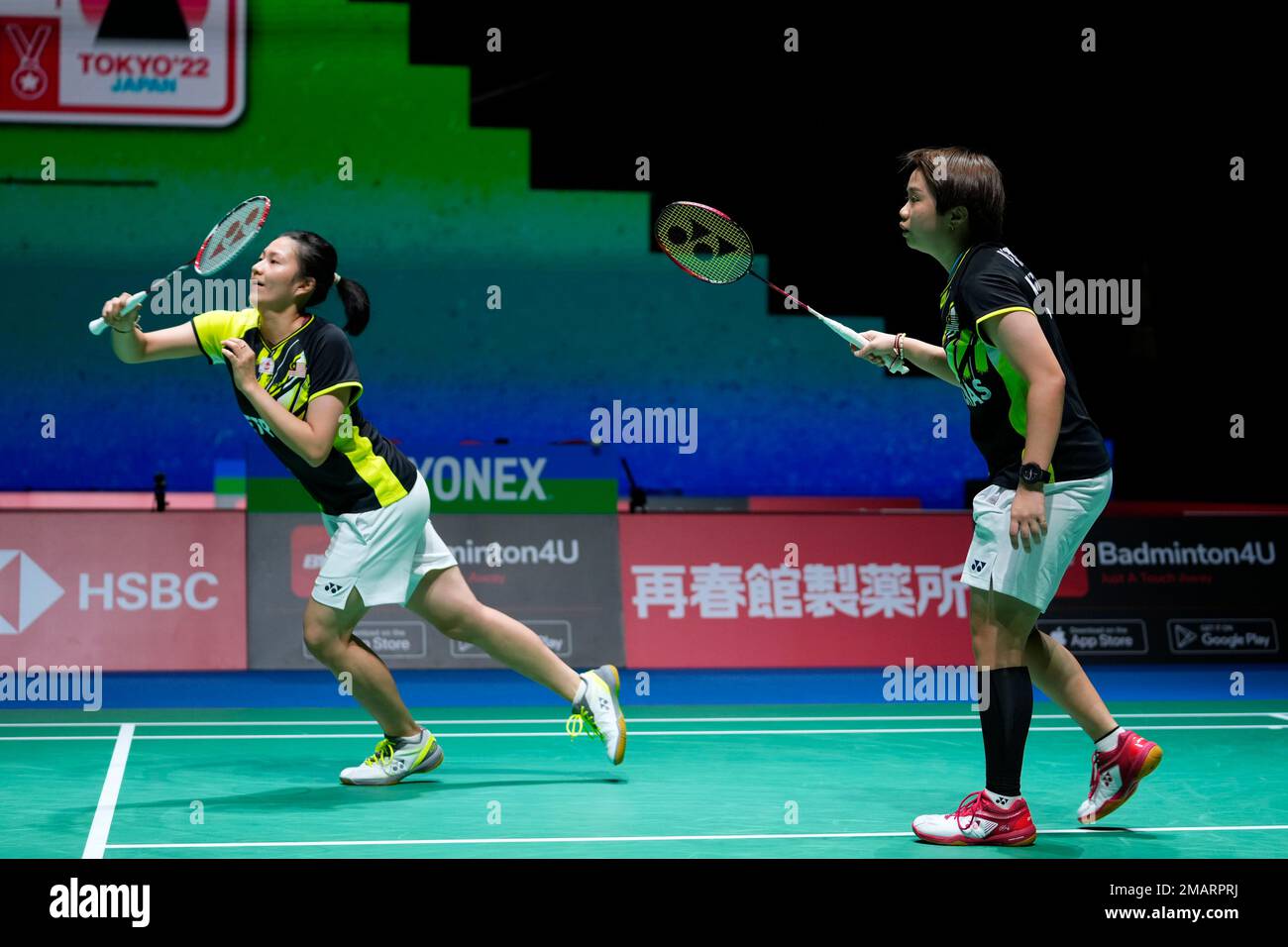 Low Yeen Yuan of Malaysia, left, and Valeree Siow compete in a ...