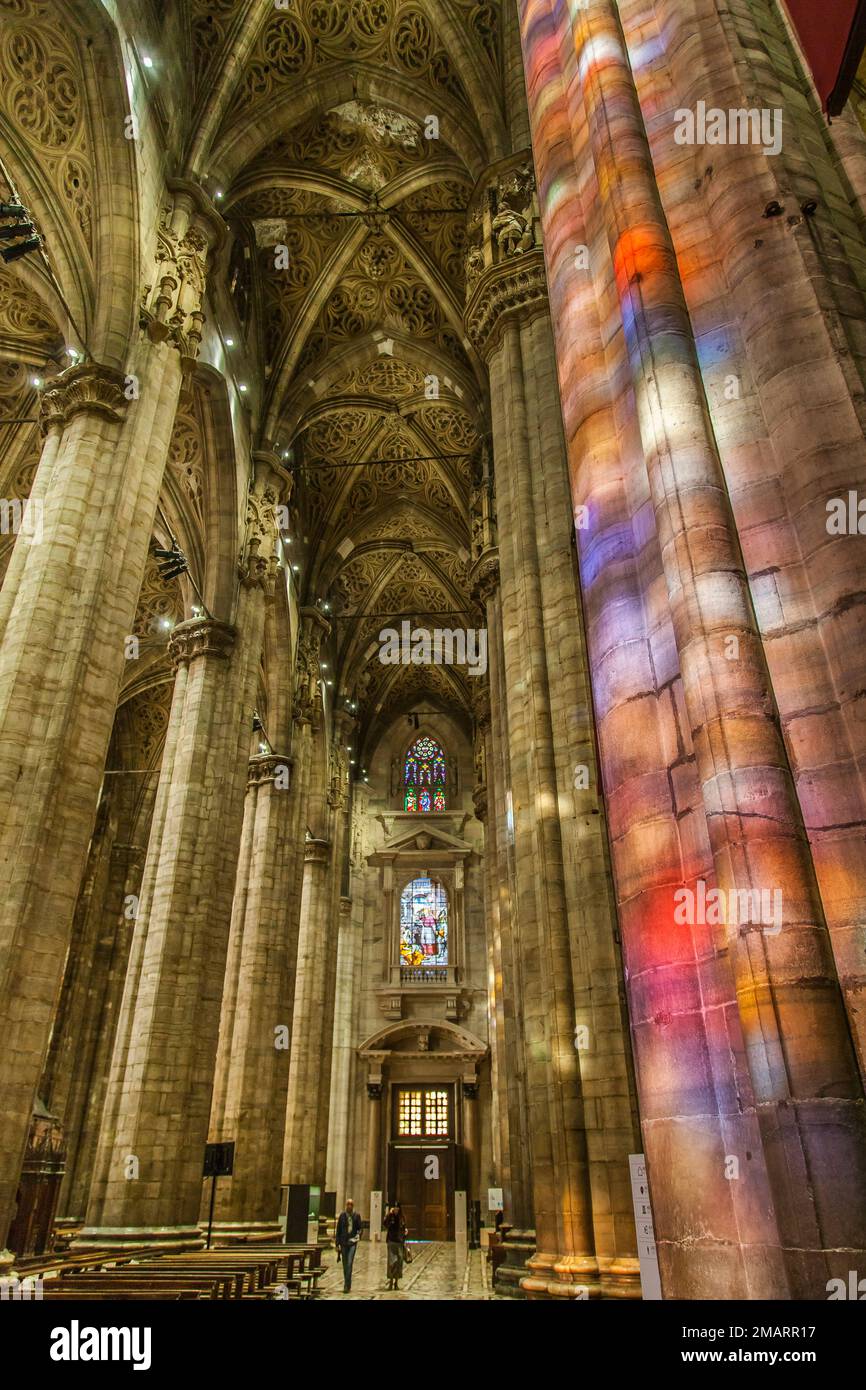 Light through stained glass windows on one of the massive supporting ...