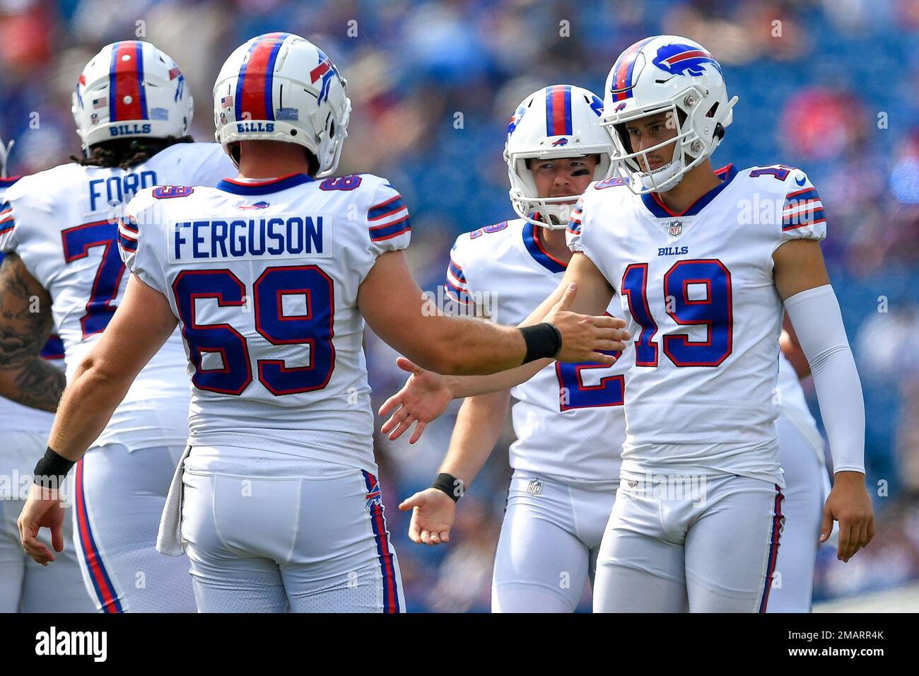 Buffalo Bills punter Matt Araiza, right, celebrates with long snapper ...