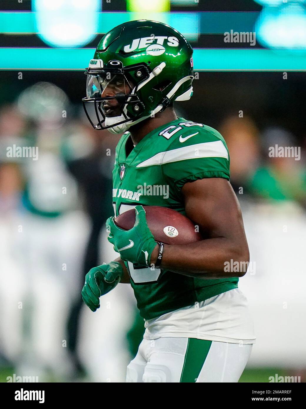 New York Jets running back Breece Hall (20) practices before a ...