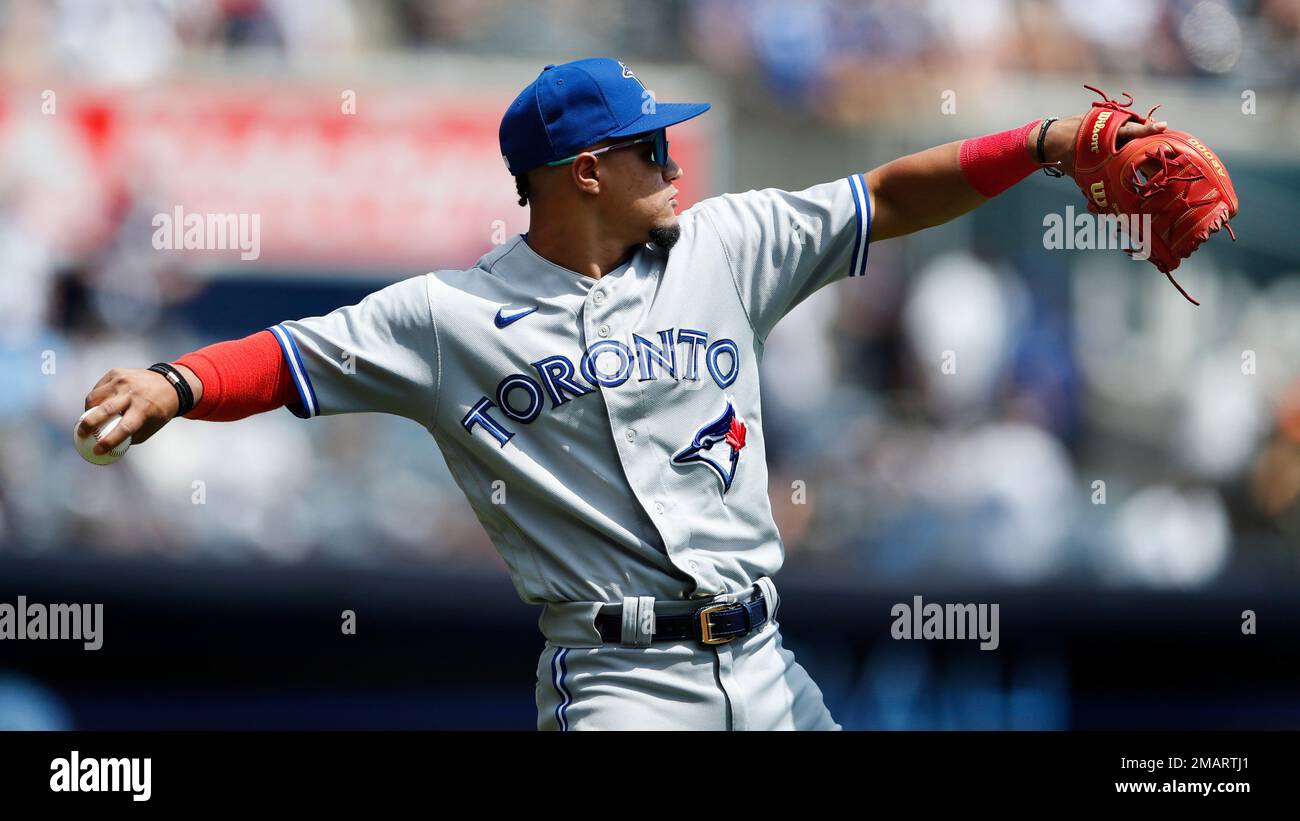 Toronto Blue Jays second baseman Santiago Espinal (5) warms up before ...