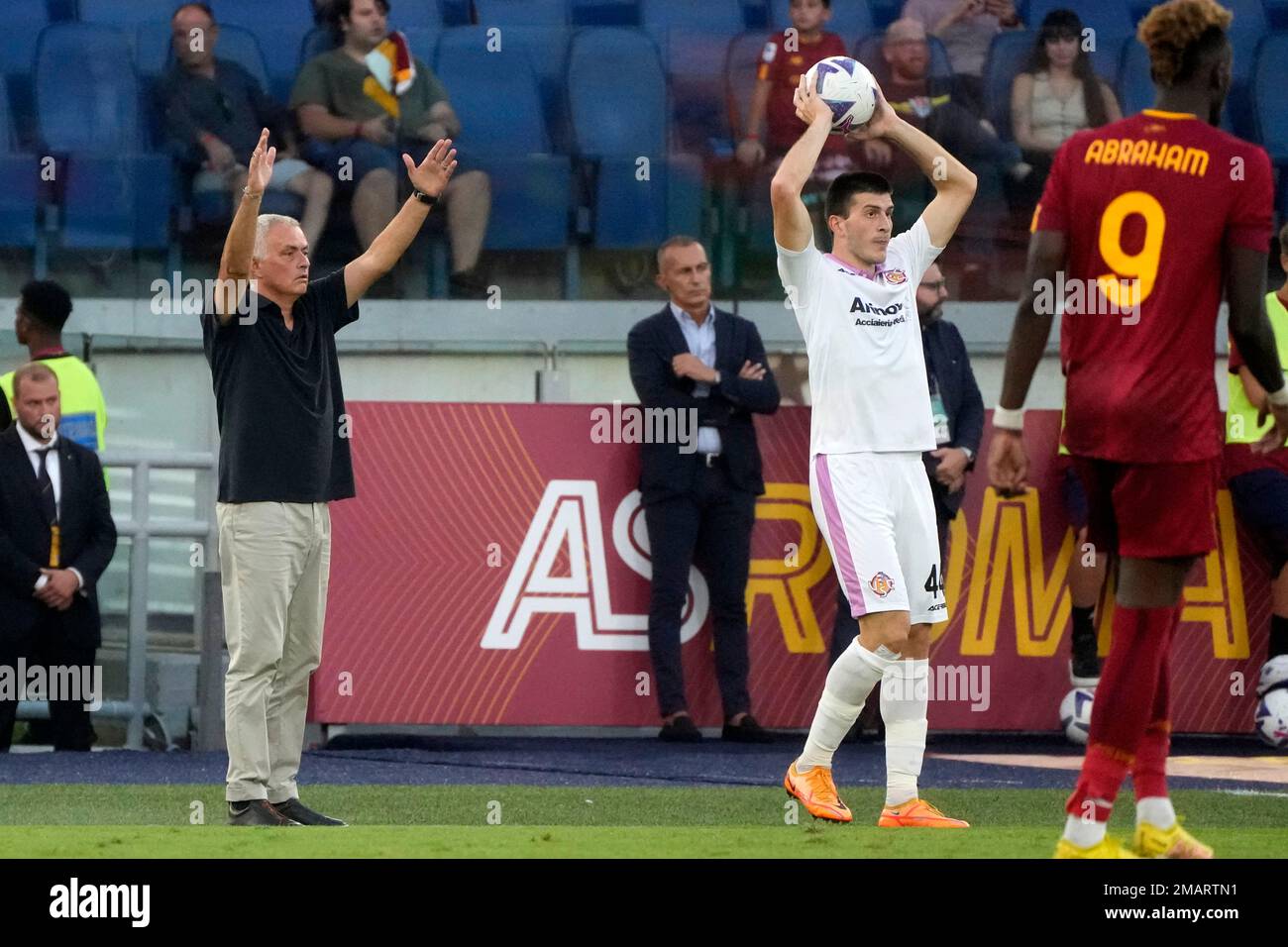 Roma's head coach Jose Mourinho, left, reacts during the Italian Serie ...