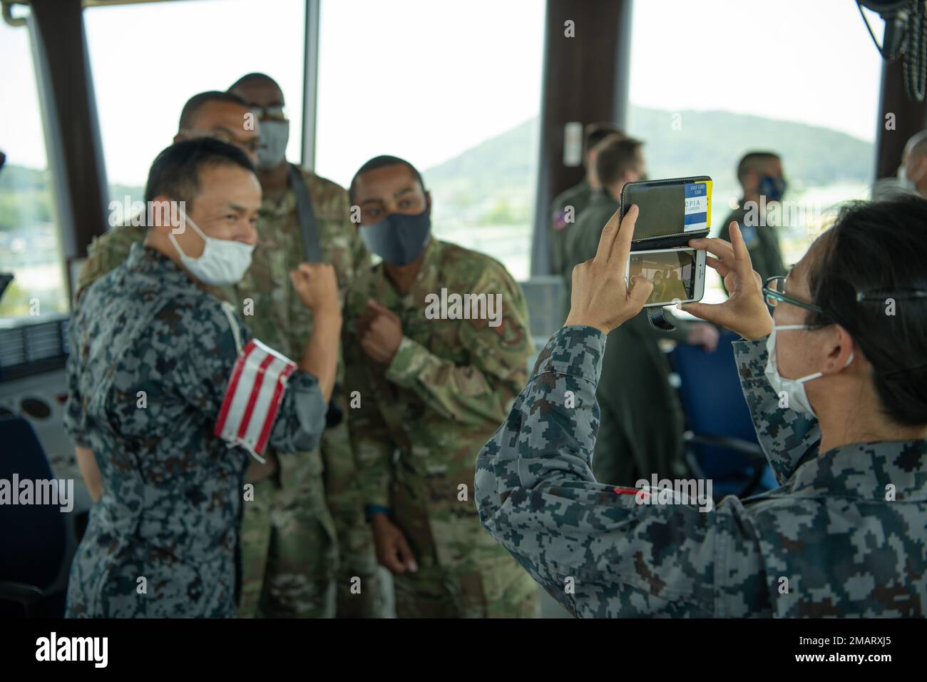 U.S. Air Force Airmen with the 374th Operational Support Squadron ...