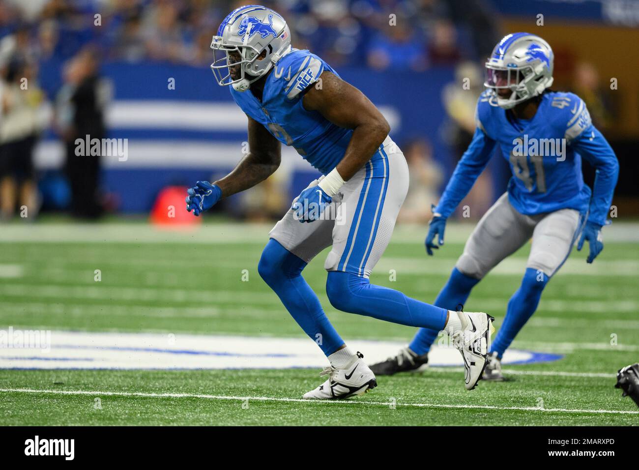Detroit Lions defensive lineman Austin Bryant (2) rushes into the ...