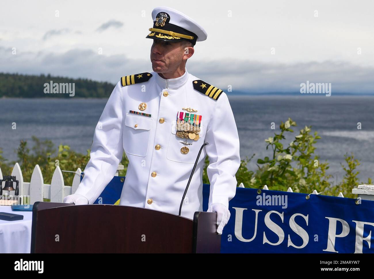 Cmdr. Trevor Conger speaks to Sailors and attendees after assuming ...