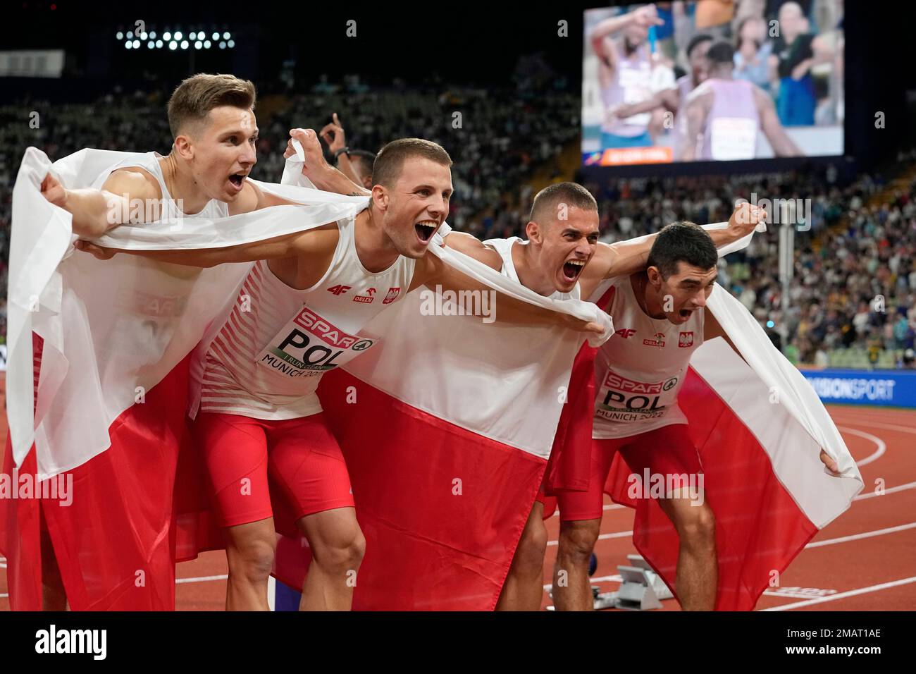 The team of Poland celebrate afterafter winning the bronze medal in the ...