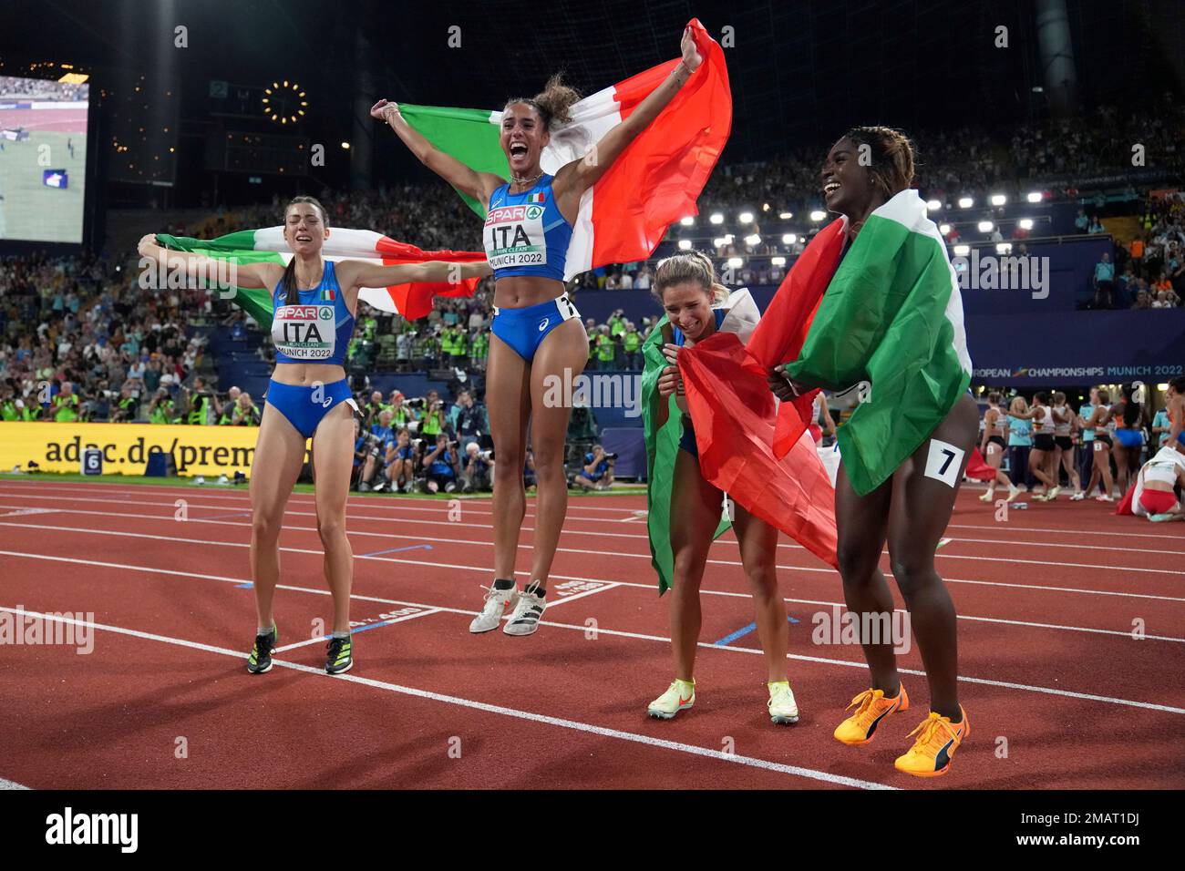 The team of Italy celebrate after winning the bronze medal in the Women ...