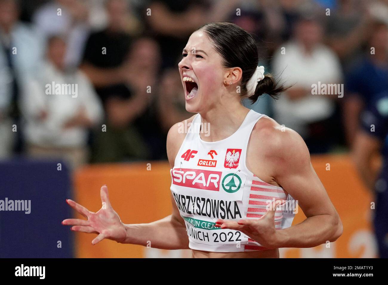 Pia Skrzyszowska, of Poland, crosses the finish line to win the gold medal in the Women's 100 ...