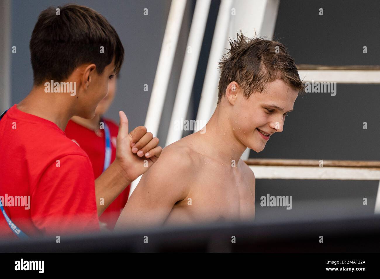 Oleksii Sereda of Ukraine, right, is given the thumbs up by a pool ...