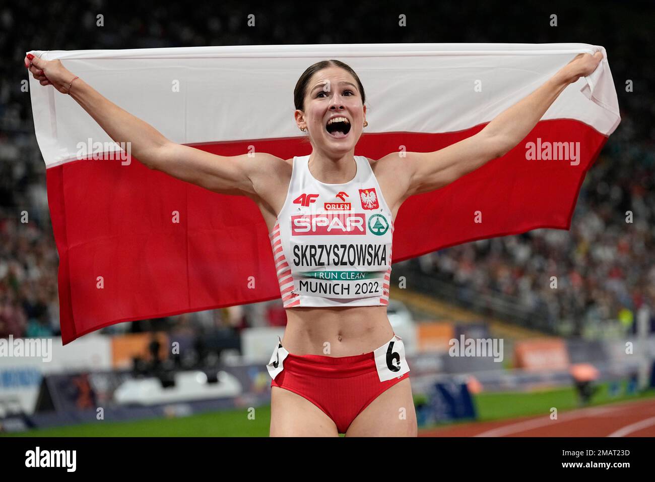 Pia Skrzyszowska, of Poland, celebrates after winning the gold medal in ...