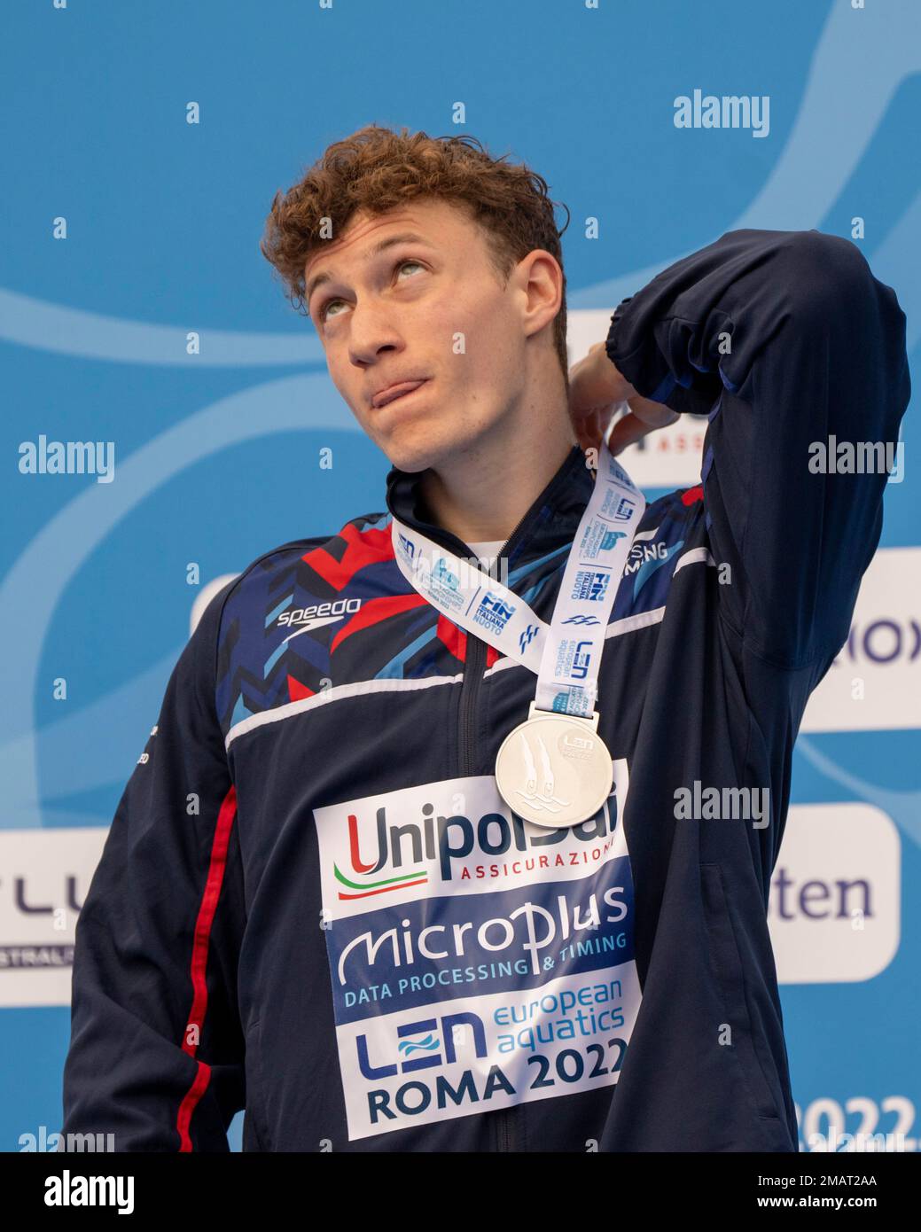 Britain's Noah Williams receives his silver medal for the men's 10m ...