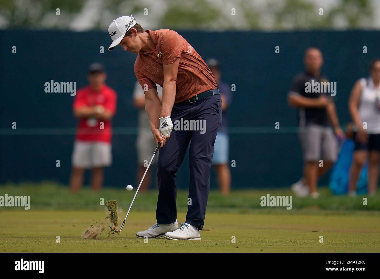 Andrew Putnam hits toward the first hole during the final round of the ...