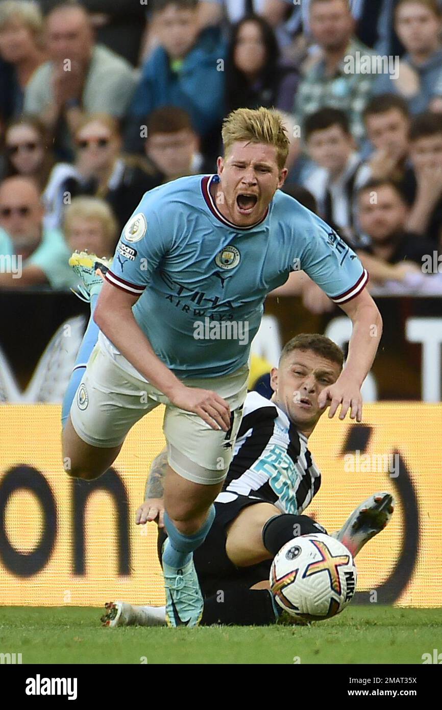 Newcastle's Kieran Trippier, right, fouls Manchester City's Kevin De ...