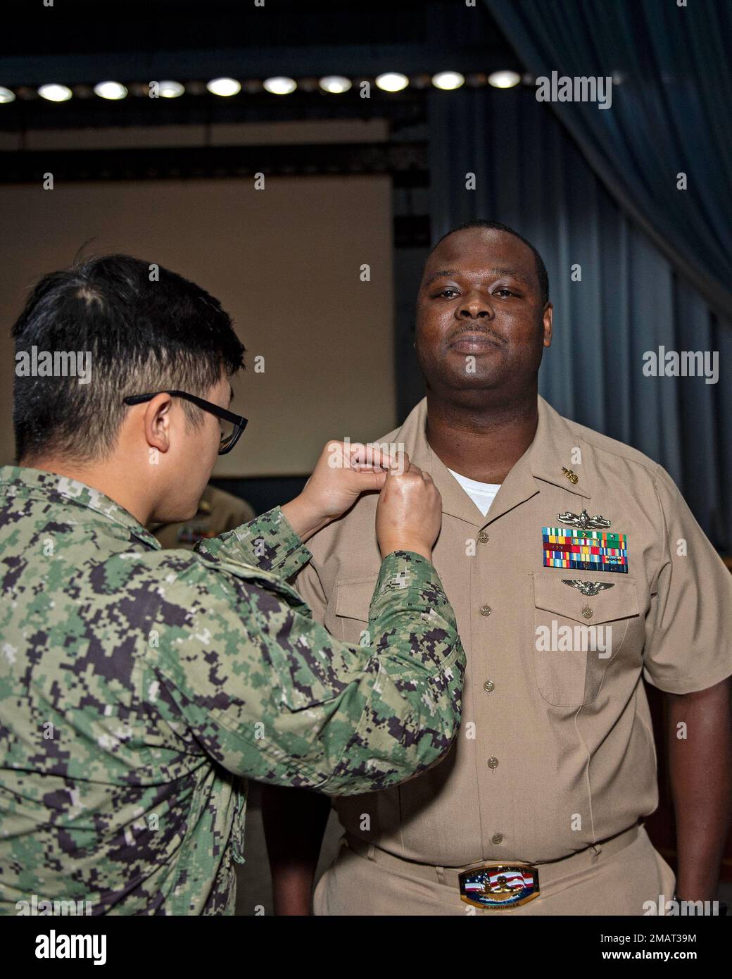 Senior Chief Yeoman Travis Scott is pinned by Yeoman Seaman Recruit ...